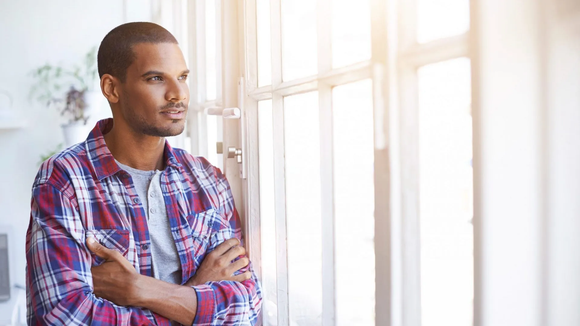 Money Advice Experts Would Give Their Younger Selves | GOBankingRates