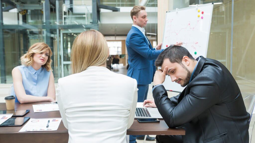 How to Succeed at Work When the Boss Hates You | GOBankingRates