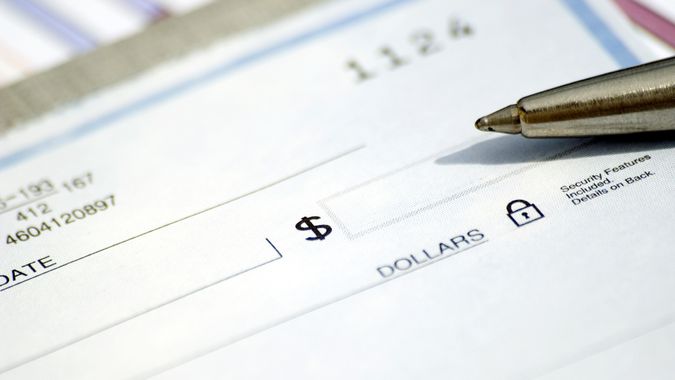 Check Kiting: What Is It and How Can You Avoid Scams? | GOBankingRates